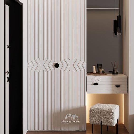 Modern Entryway Design Featuring Geometric Paneled Wardrobe, Floating ...